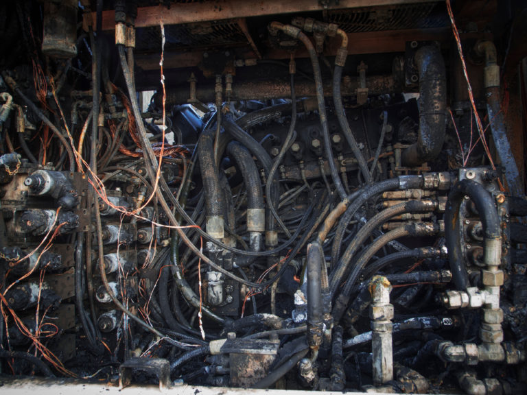 Heavy Machinery Fires Caused by Hydraulic Hose Failures | Warren Forensics